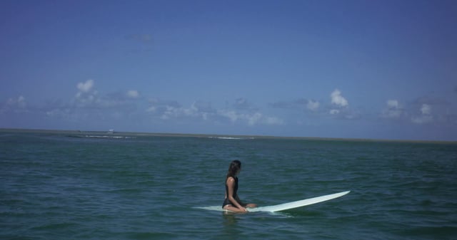 A female surfer waiting for a wave - Free Stock Video Footage | Coverr