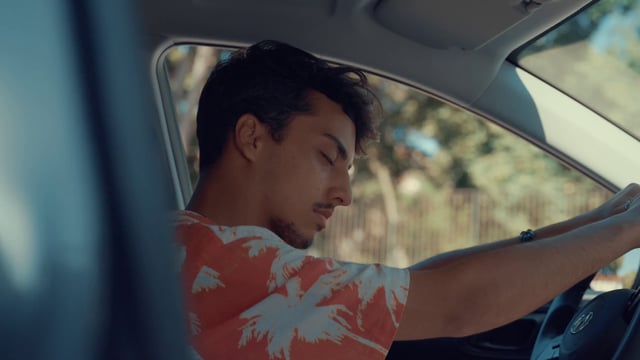 Teenage boy sitting in his car bopping his head to music - Free Stock ...