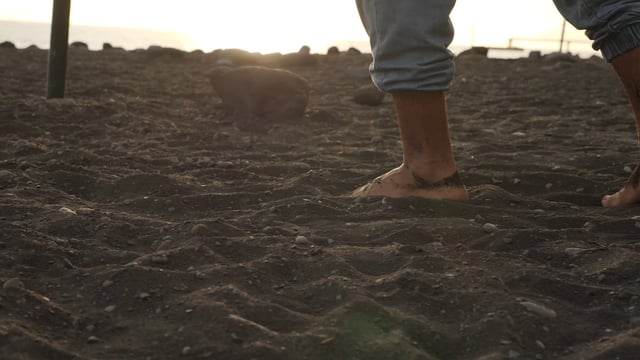 Kicking the sand - Free Stock Video Footage | Coverr