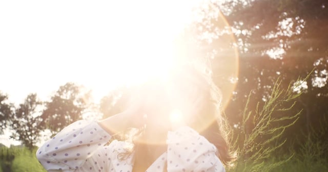 Woman enjoying the sunshine - Free Stock Video Footage | Coverr