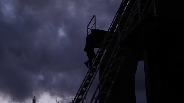 Man in suit climbing down a ladder - Free Stock Video Footage | Coverr