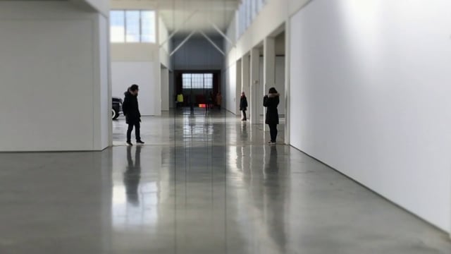 People walking around a white building - Free Stock Video Footage | Coverr