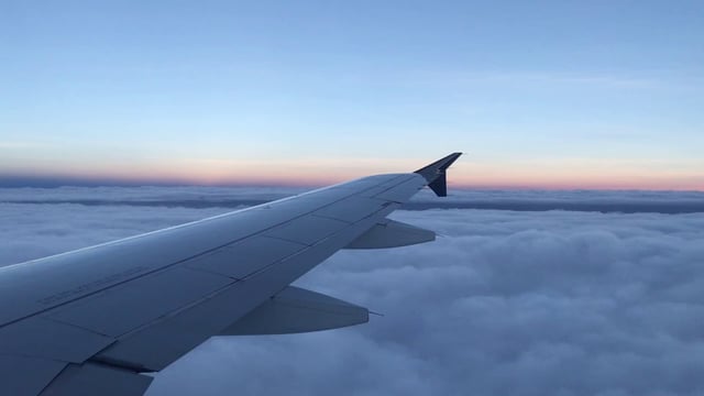 Airplane flying through the clouds - Free Stock Video Footage | Coverr