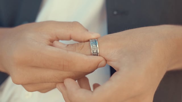 A man taking a ring off one finger and putting it on another - Free ...